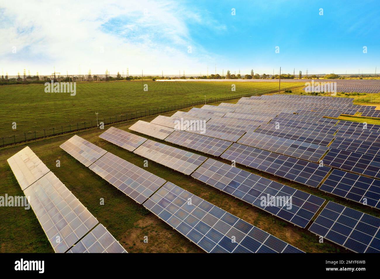 Solar panels installed outdoors, aerial view. Alternative energy source ...