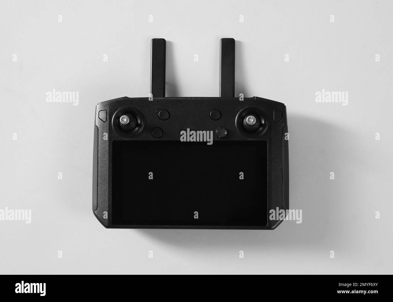 New modern drone controller on light background, top view Stock Photo ...