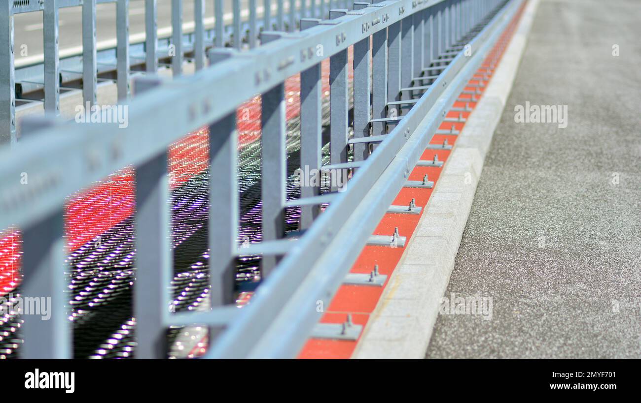 Safety barriers on the highway. Anodized safety steel barrier on ...