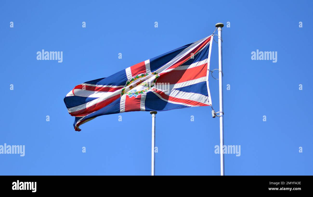 Union flag flying in wind. British Union Jack flag flying in the wind ...