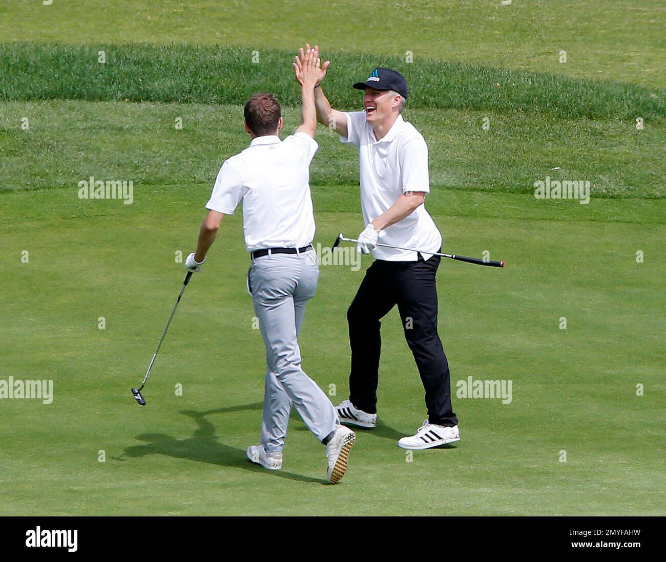 German soccer players Bastian Schweinsteiger, right, and Thomas Mueller ...