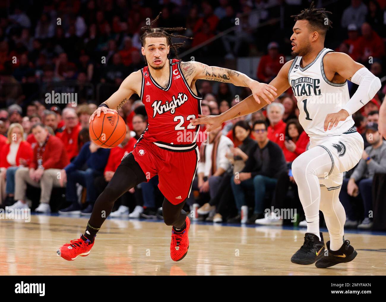 Rutgers guard Caleb McConnell (22) drives to the basket against ...