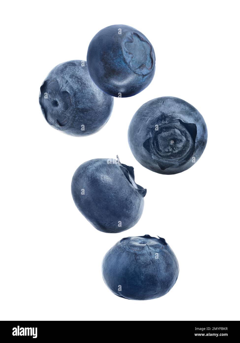 Many fresh ripe blueberries falling on white background Stock Photo - Alamy