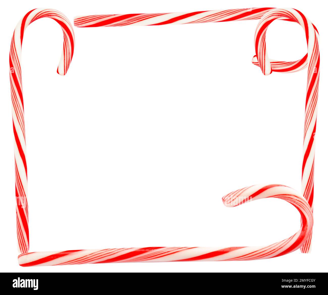 Frame of tasty Christmas candy canes on white background Stock Photo ...