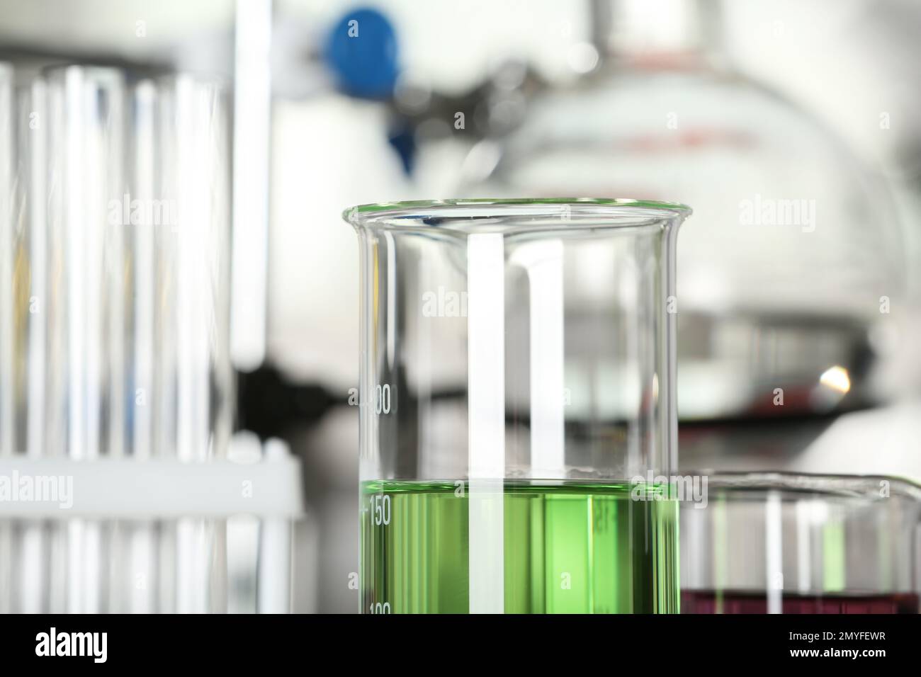 Glass beaker with liquid sample, closeup. Laboratory analysis Stock ...