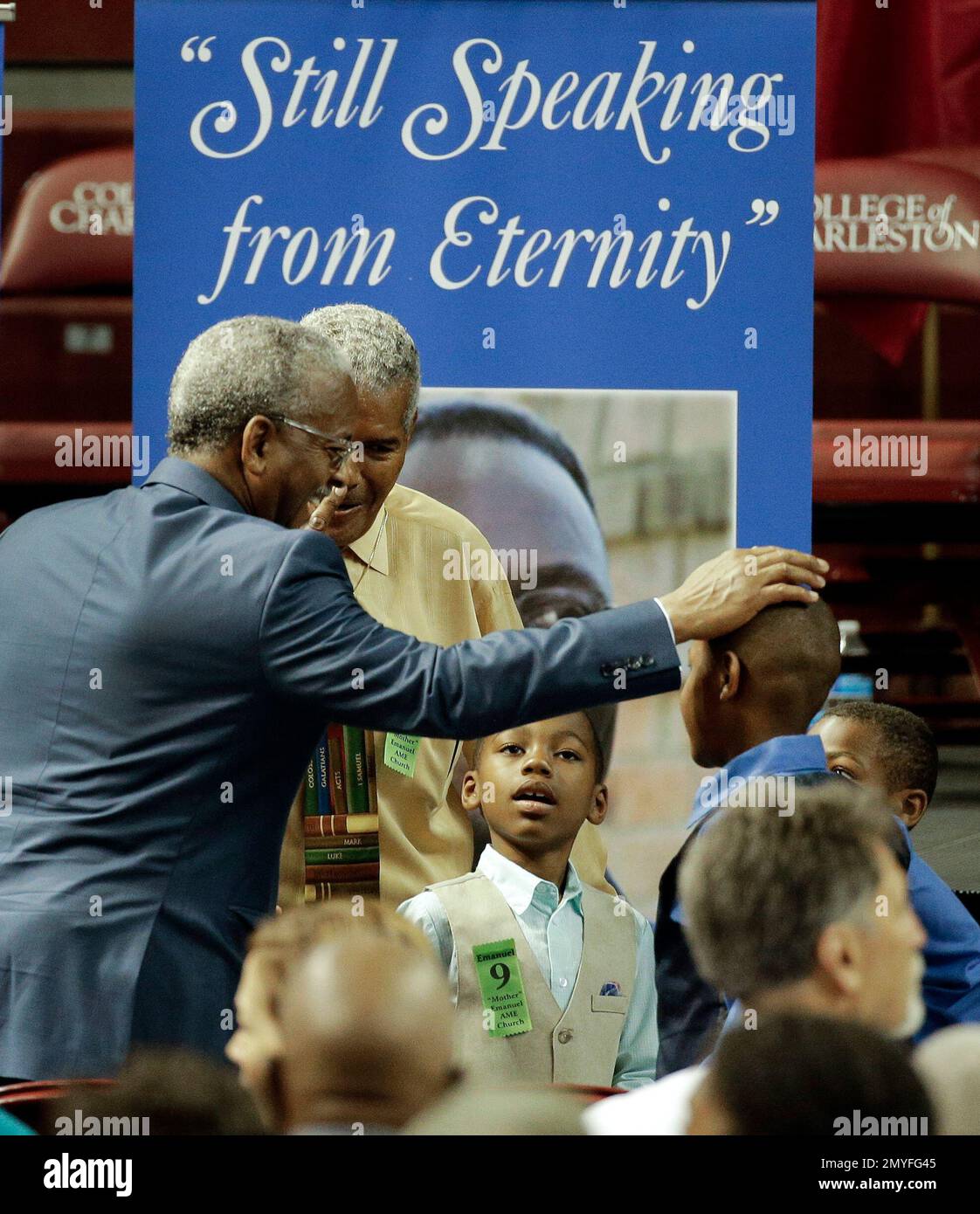 Rev. Anthony Thompson, left, husband of victim Myra Thompson, greets ...