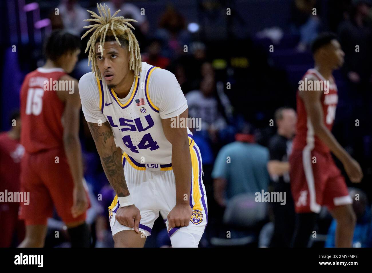 LSU guard Adam Miller (44) stops to catch his breath as his team falls ...