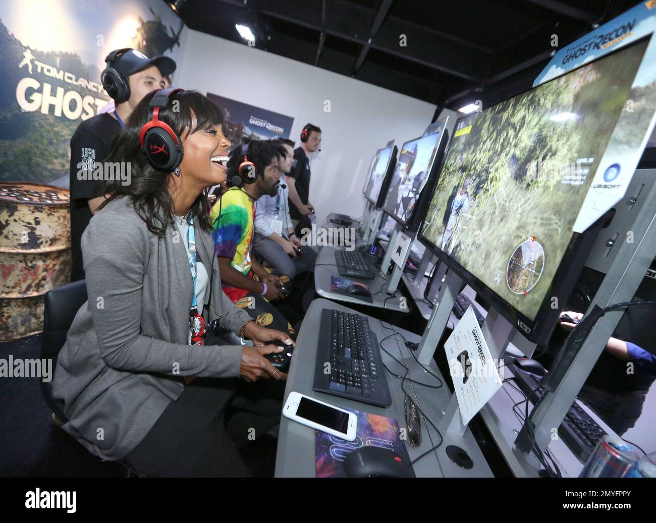 Aisha Tyler playing Tom Clancy's Ghost Recon Wildlands at Ubisoft E3 2016 - Day 2 at the Los ...