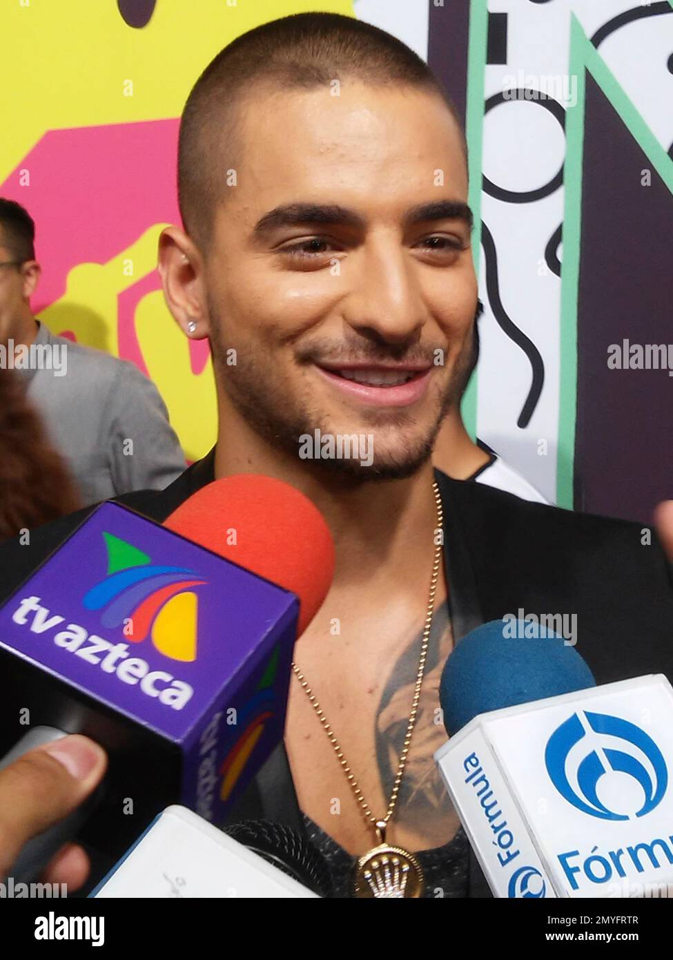 Colombian singer Maluma is interviewed on the red carpet at the MTV ...