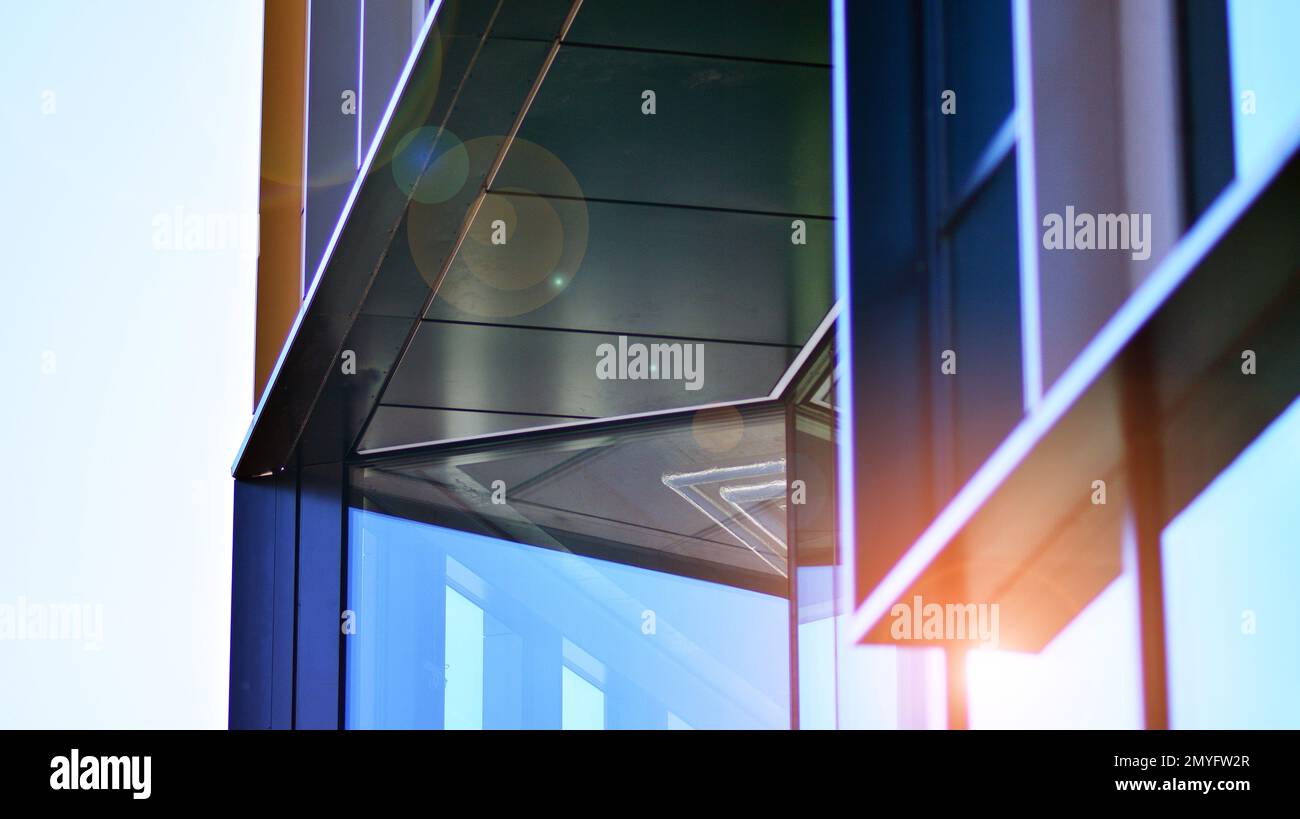 Minimalist glass facade, steel framework holding the large transparent ...