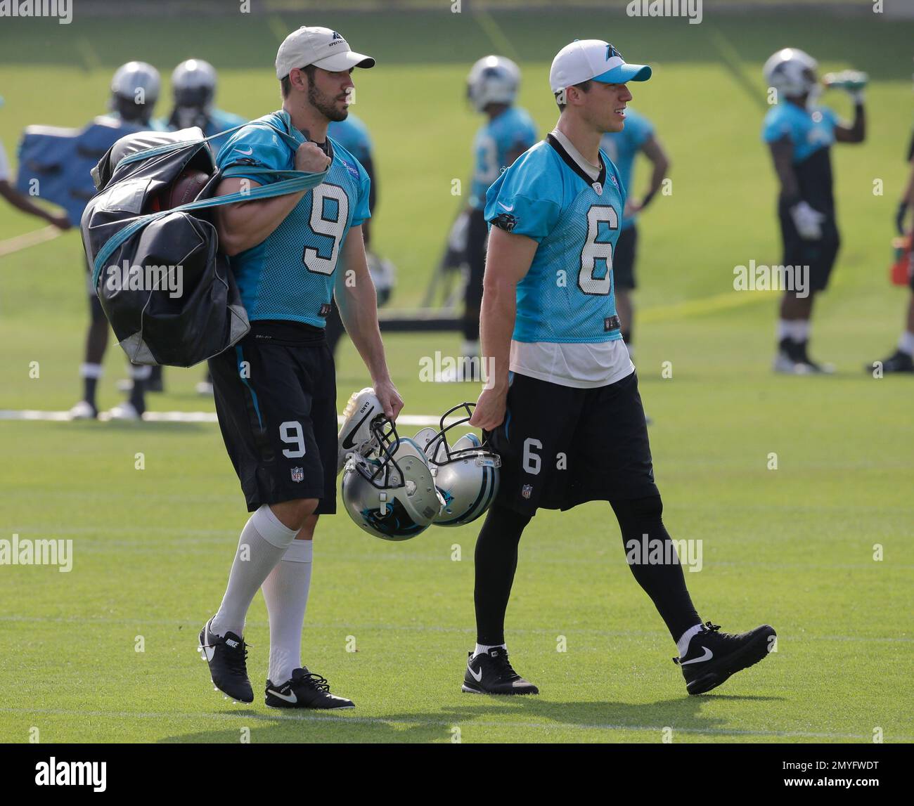 Carolina Panthers' Graham Gano (9) and Swayze Waters (6) walk across ...