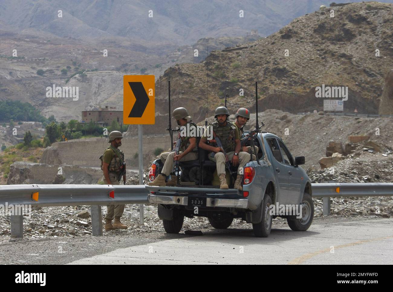 Pakistan army troops patrol in Pakistan near the Torkham border post ...