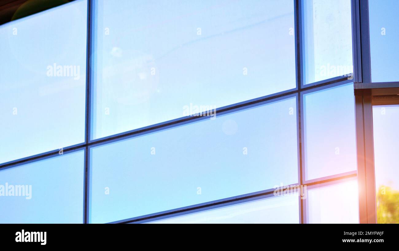 Minimalist glass facade, steel framework holding the large transparent ...