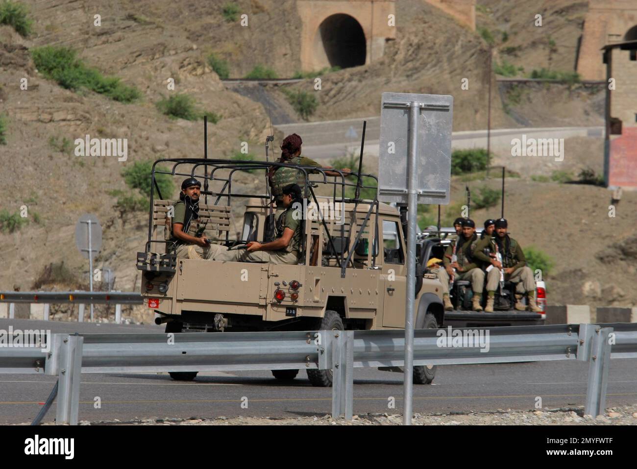 Pakistan army troops patrol near the Torkham border post between ...