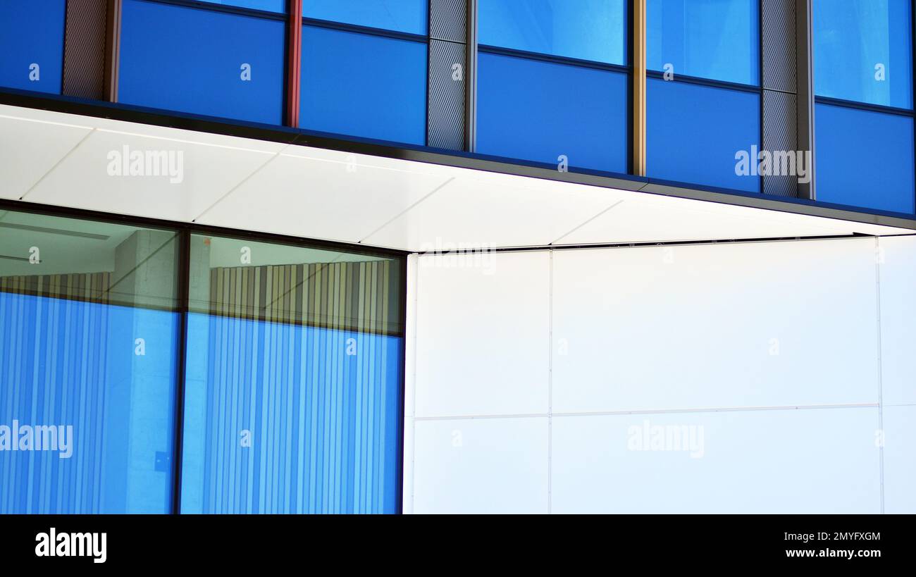 Minimalist glass facade, steel framework holding the large transparent ...