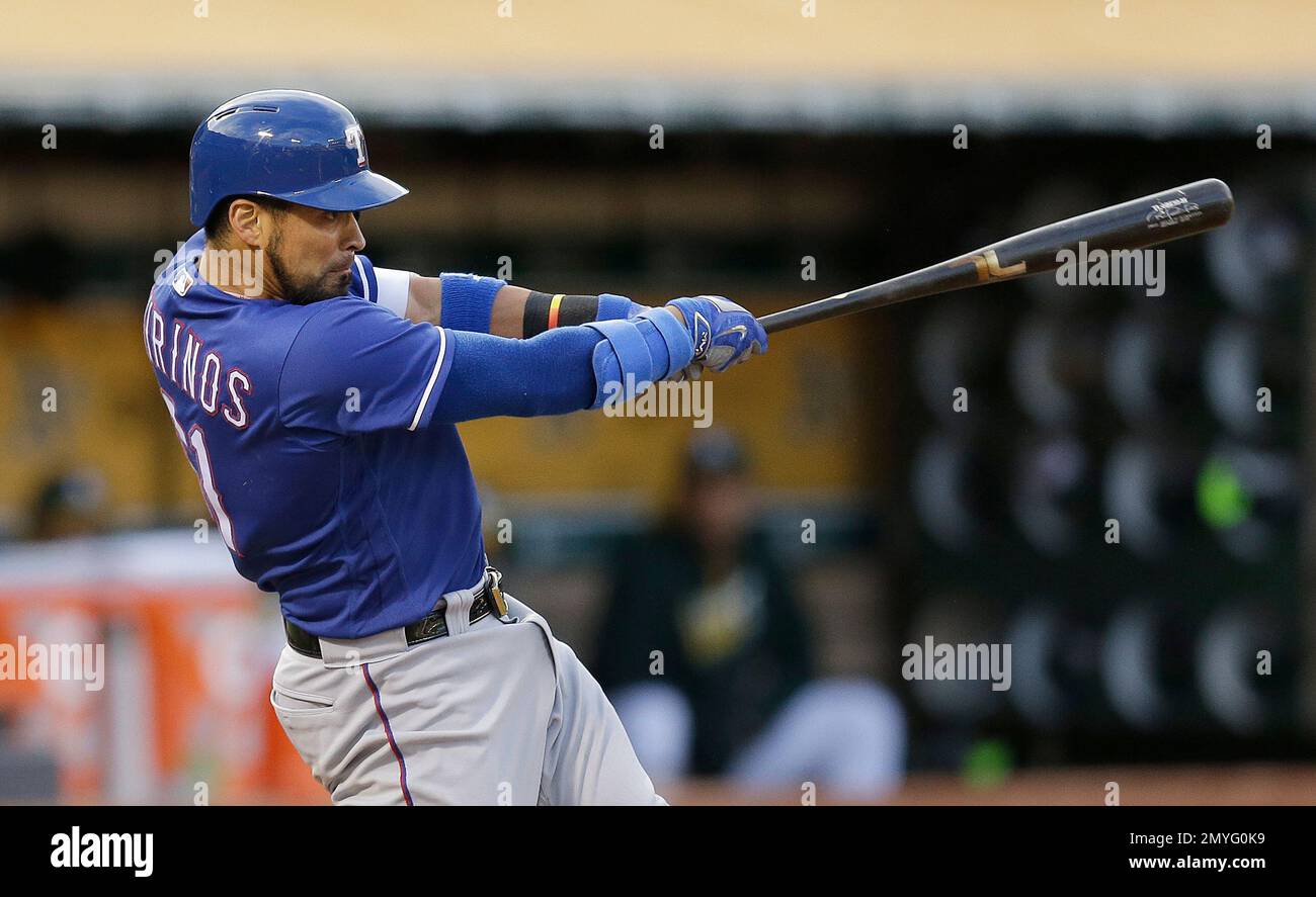 Texas Rangers' Robinson Chirinos swings for a three-run home run off ...