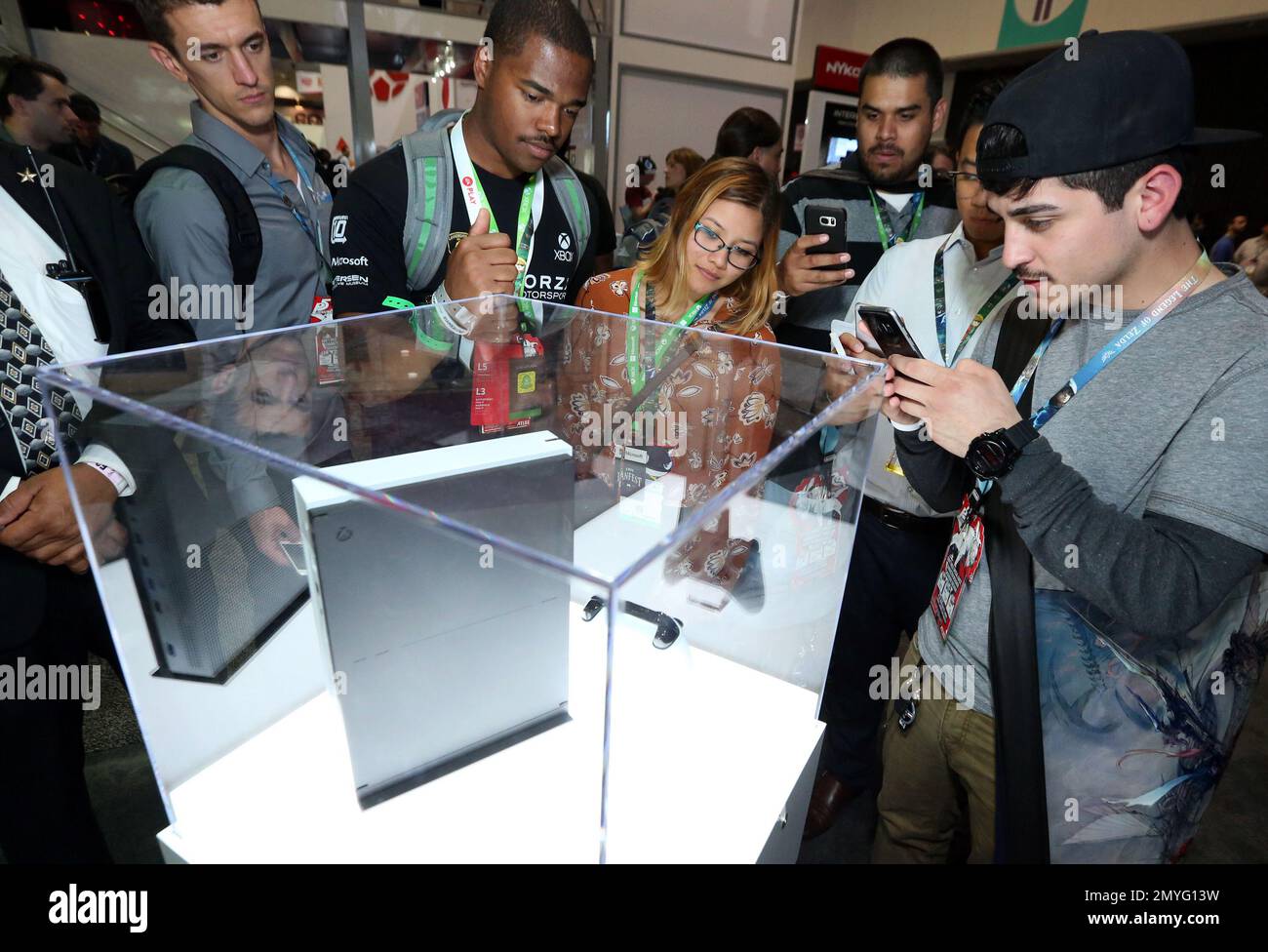 IMAGE DISTRIBUTED FOR MICROSOFT - Crowds admire the new Xbox One S on ...