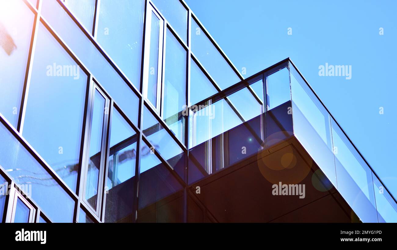 Minimalist glass facade, steel framework holding the large transparent ...