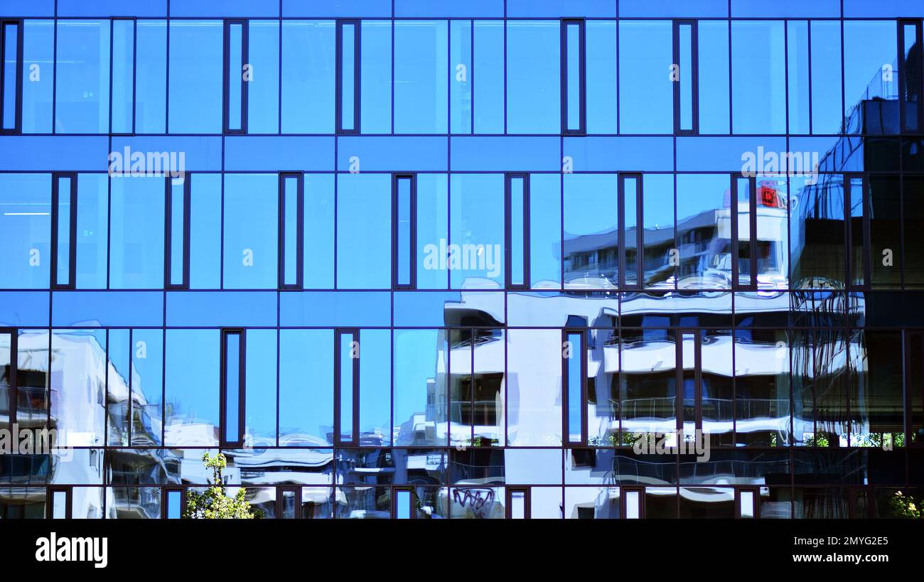 Minimalist glass facade, steel framework holding the large transparent ...