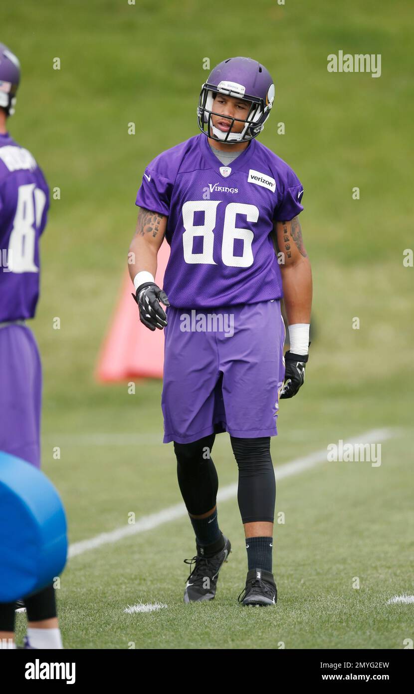 Minnesota Vikings rookie tight end Kyle Carter takes part in a passing ...