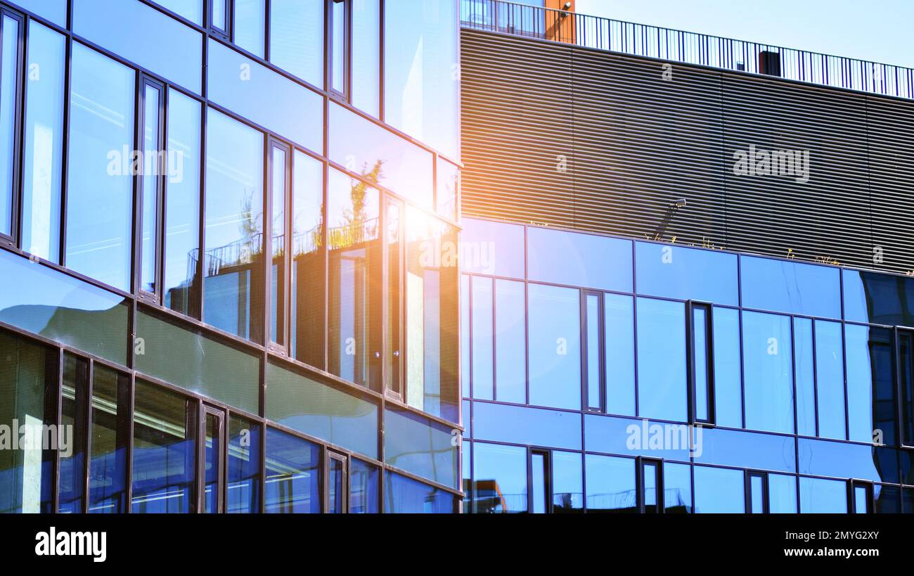 Minimalist glass facade, steel framework holding the large transparent ...