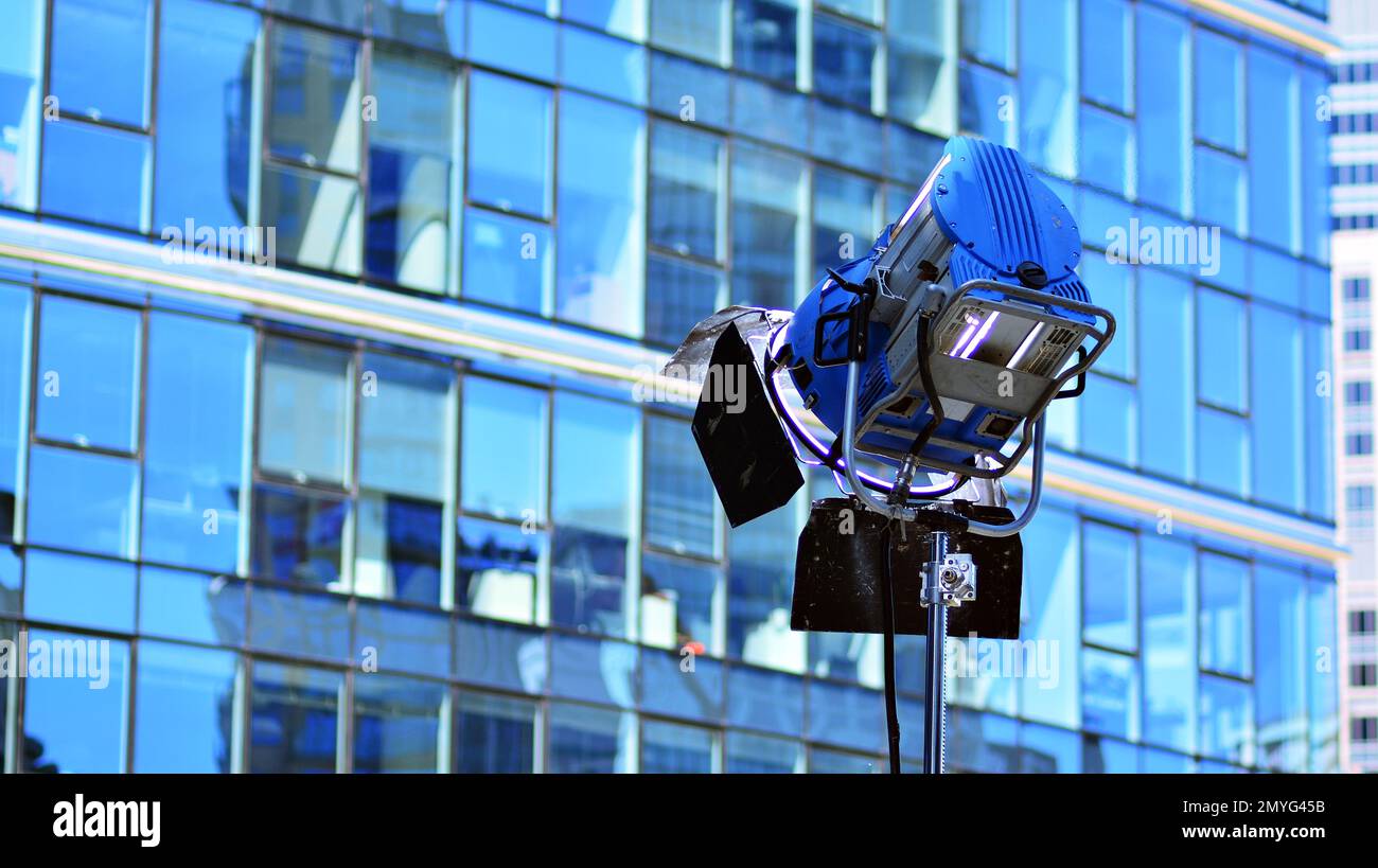 High powered spotlight illuminating an outdoor movie set Stock Photo ...