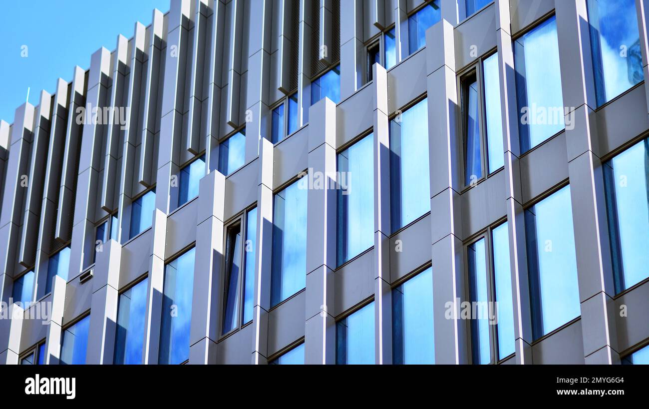 Minimalist glass facade, steel framework holding the large transparent ...