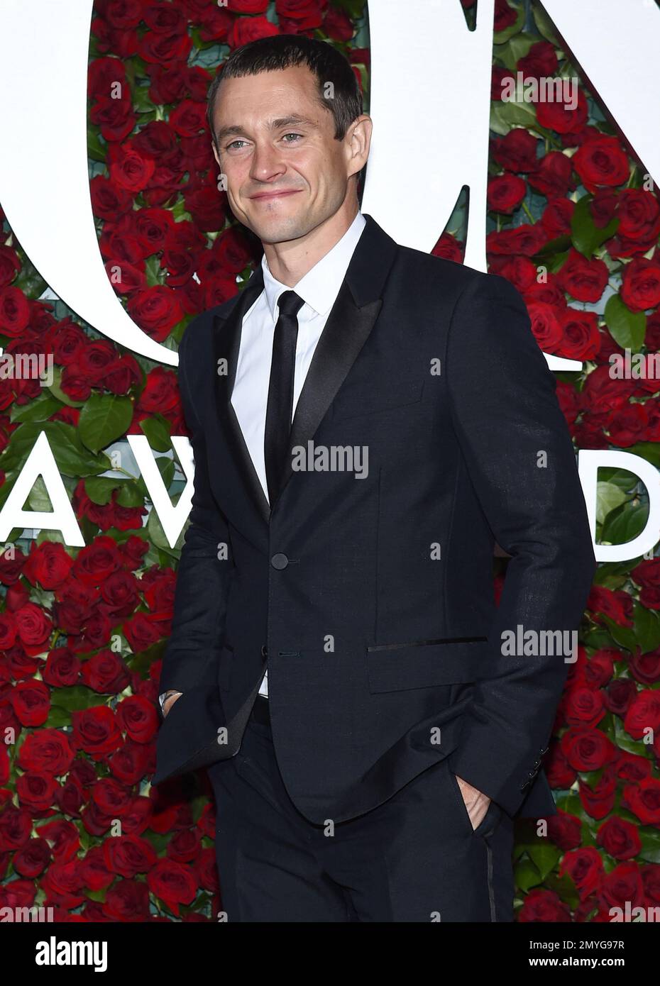 Hugh Dancy arrives at the Tony Awards at the Beacon Theatre on Sunday ...