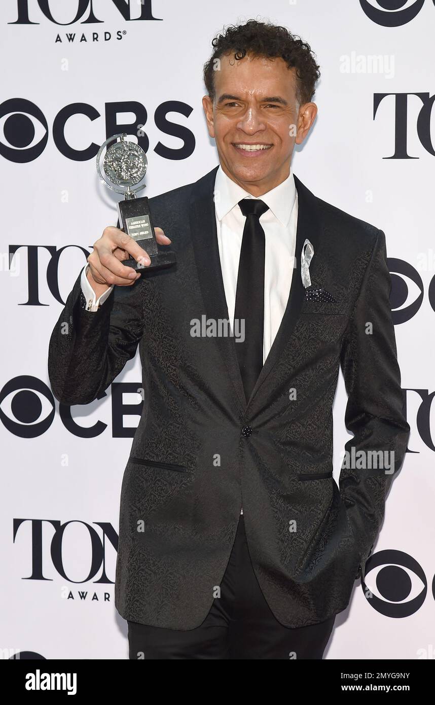 Brian Stokes Mitchell poses in the press room with the Isabella ...