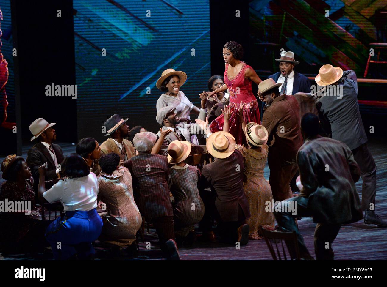 Heather Headley, standing, and the cast of “The Color Purple” perform ...
