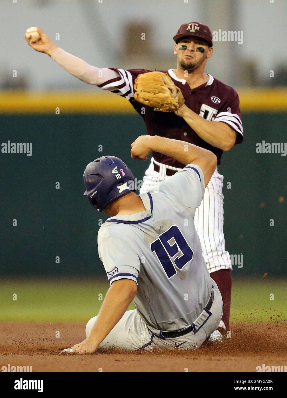 TCU's Luken Baker (19) is forced out at second as Texas A&M's Ryan Birk ...