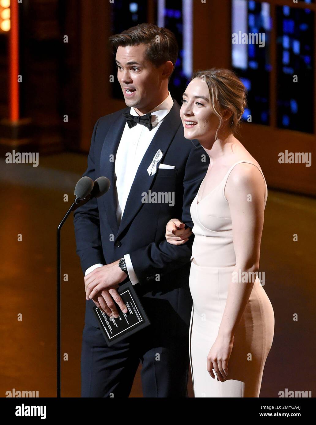 Andrew Rannells, left, and Saoirse Ronan present the award for featured ...