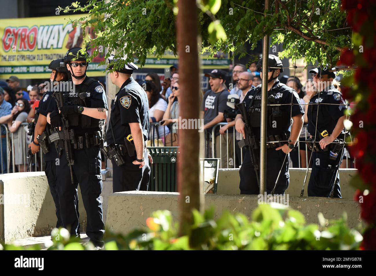 Police officers stand guard outside the Tony Awards at the Beacon ...
