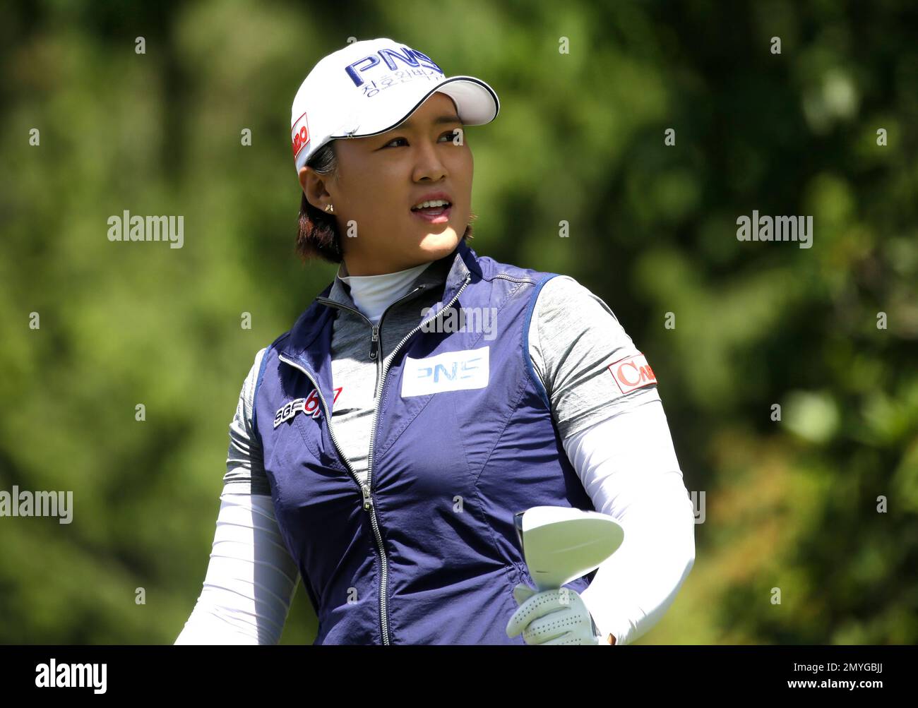 Amy Yang, of South Korea, watches the path of her tee shot on the first ...
