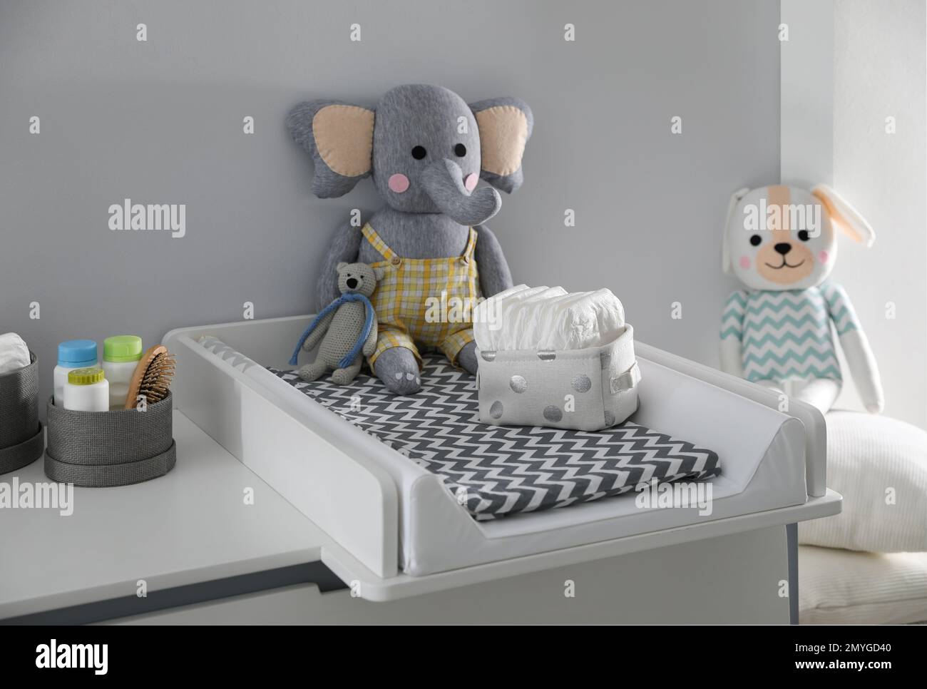 Modern changing table in baby room. Interior design Stock Photo - Alamy