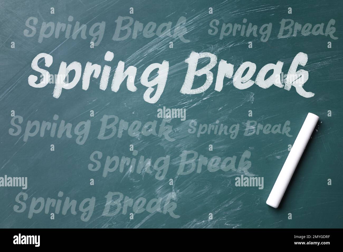 Text Spring Break and chalk on greenboard, top view. School holiday ...