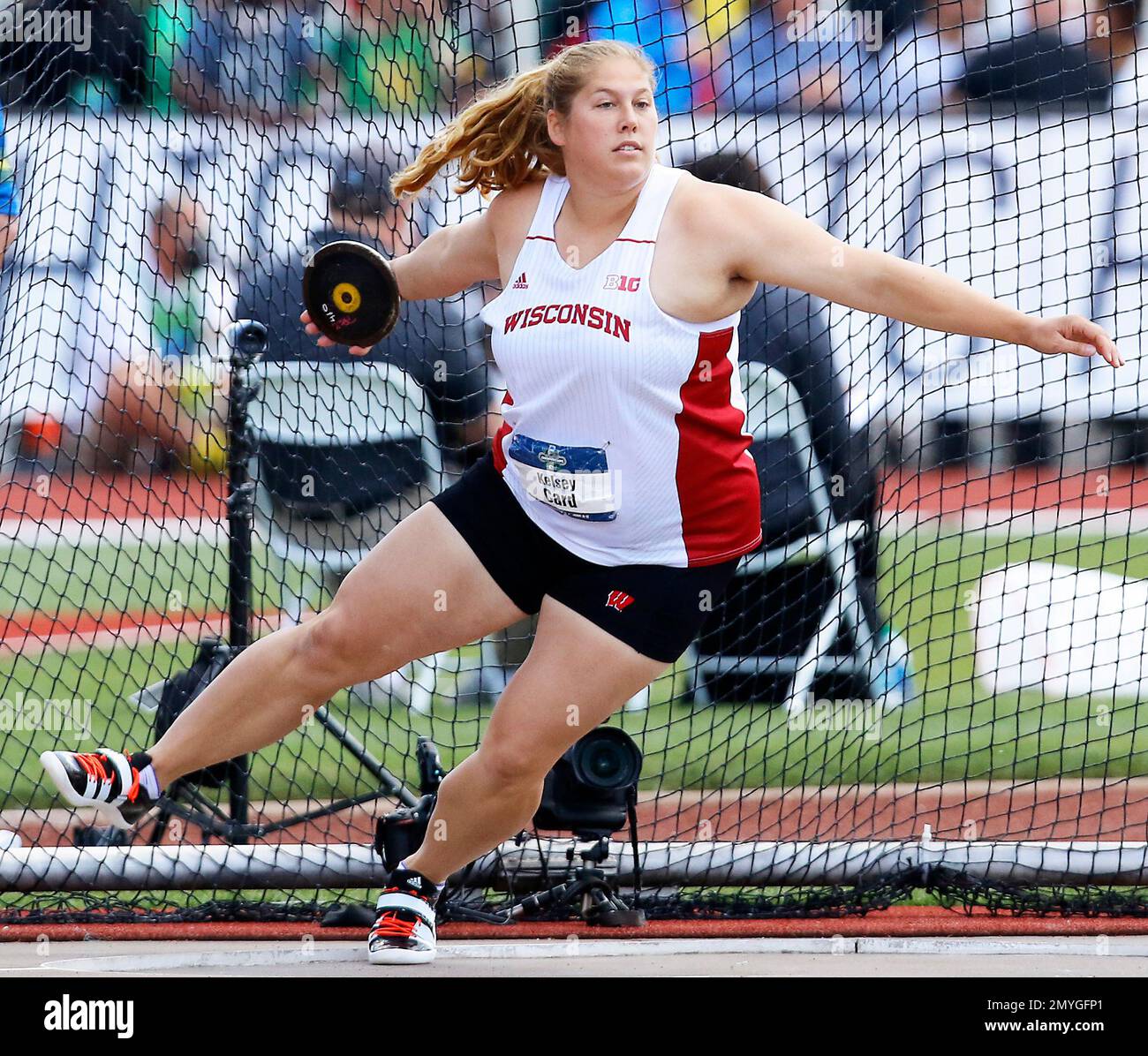 Wisconsin's Kelsey Card competes in the women's discus at the NCAA ...