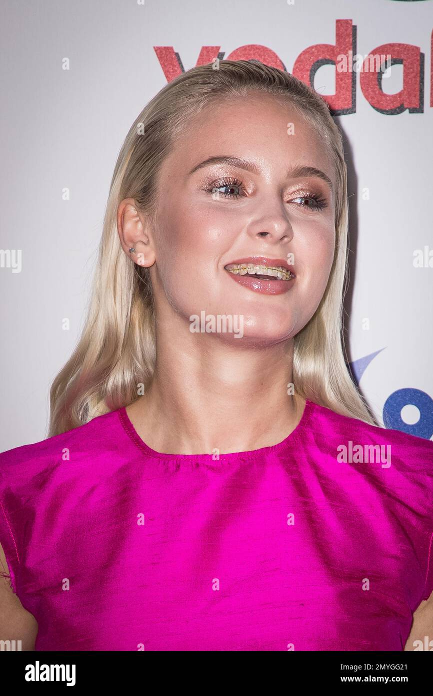 Singer Zara Larson poses for photographers before performing on stage ...