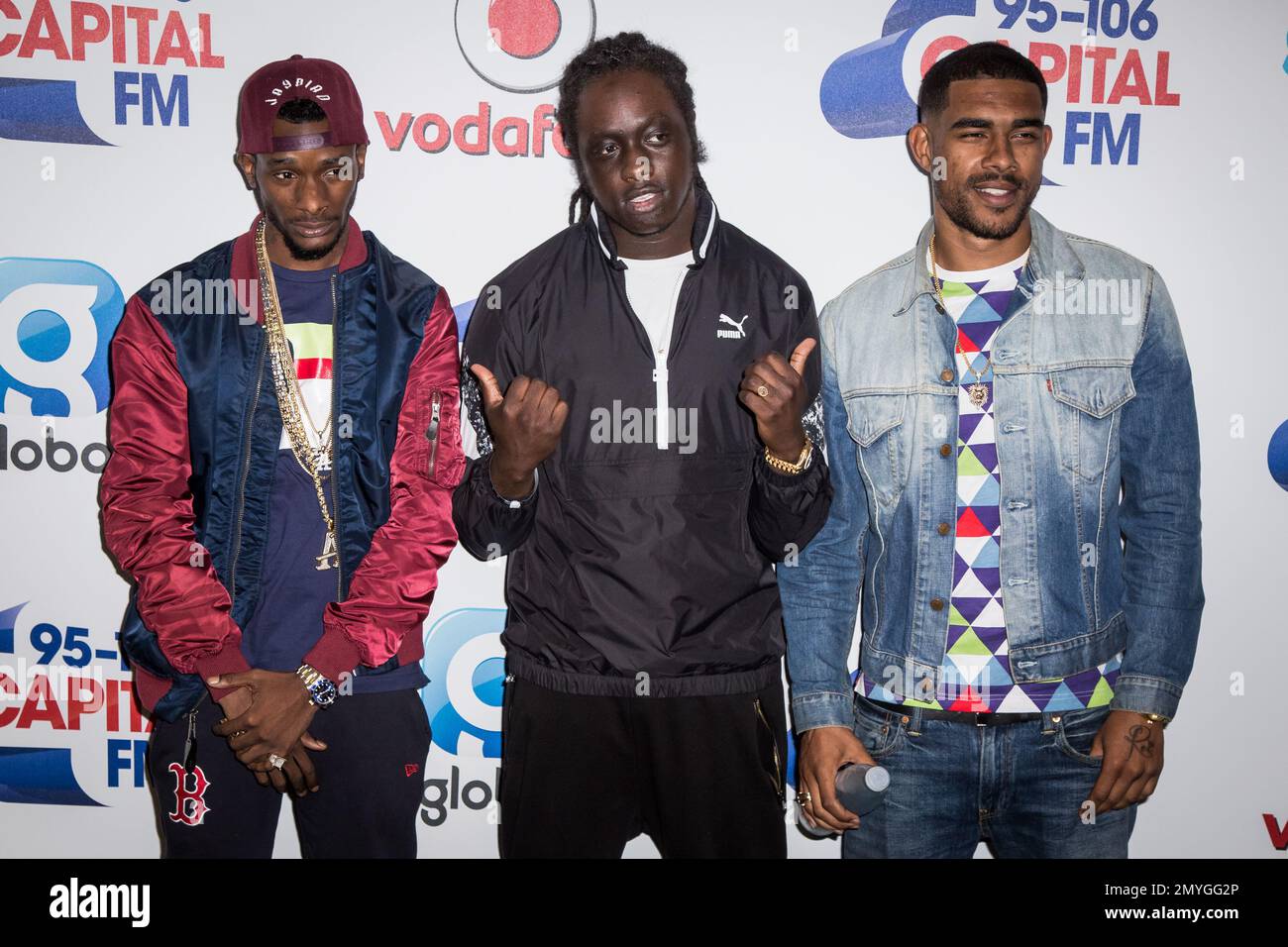 Akelle Charles, Haile Rei and Louis Rei of WSTRN pose for photographers ...