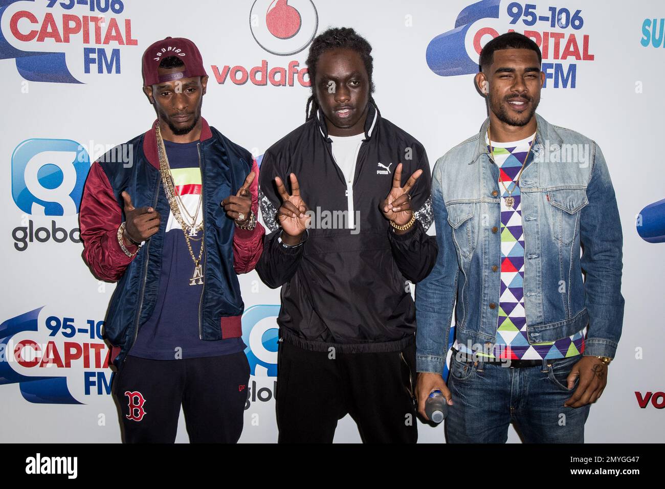 Akelle Charles, Haile Rei and Louis Rei of WSTRN pose for photographers ...