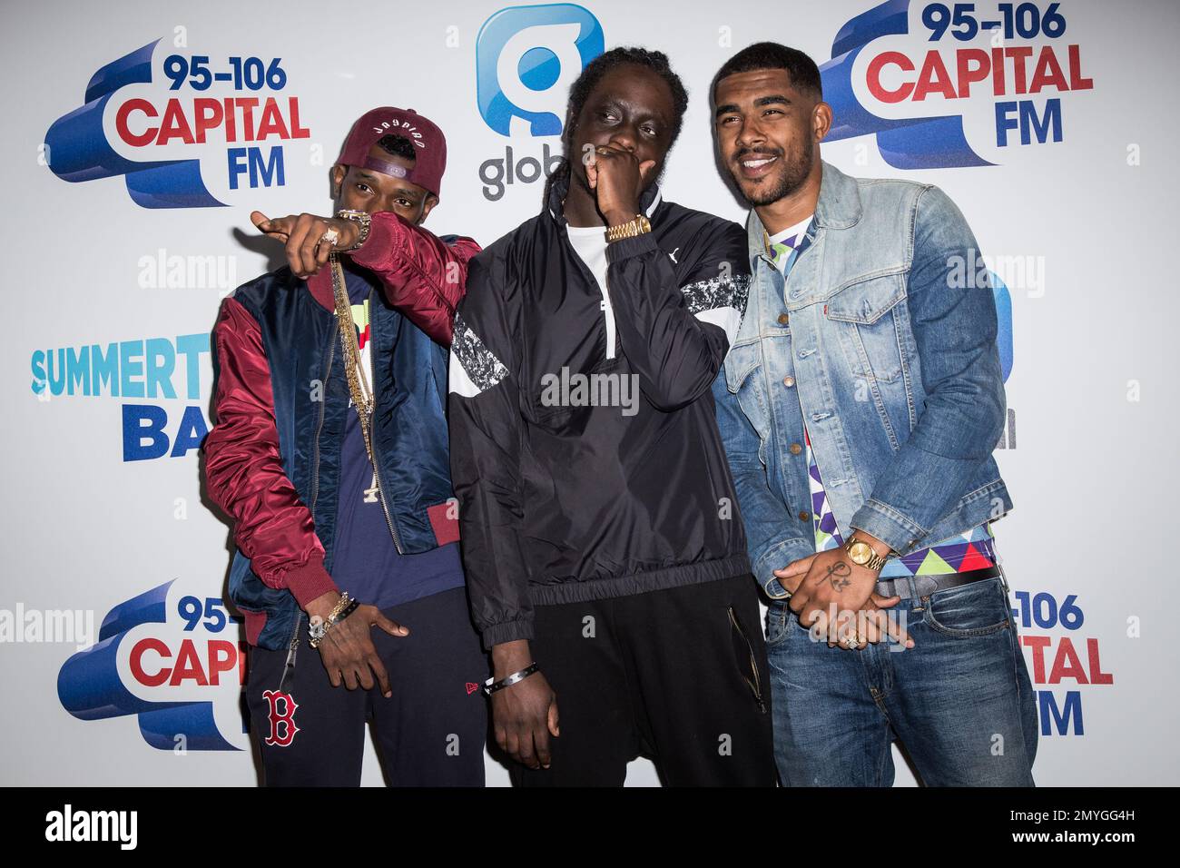 Akelle Charles, Haile Rei and Louis Rei of WSTRN pose for photographers ...