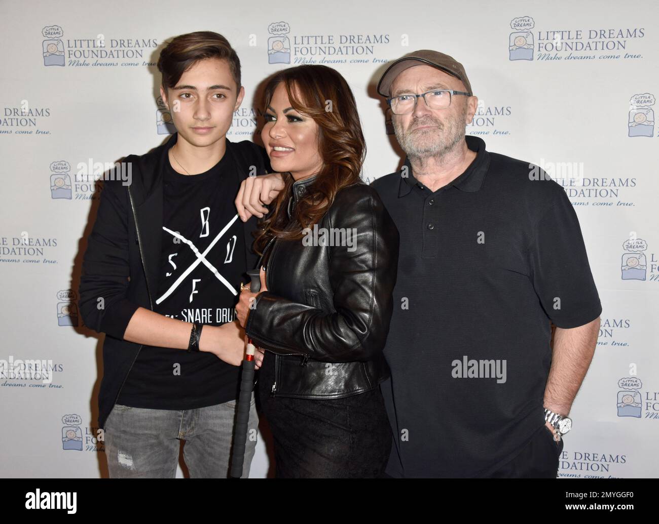 Nic Collins, from left, Orianne Collins and Phil Collins judge the ...