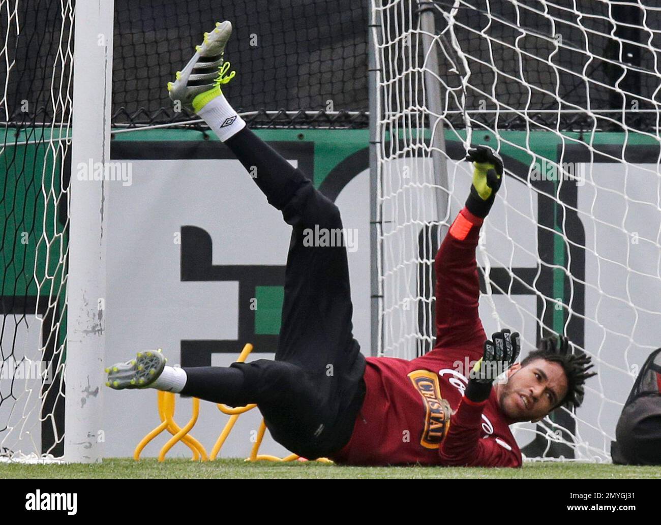 Peru goalkeeper Pedro Gallese rolls after making a save during a Copa ...