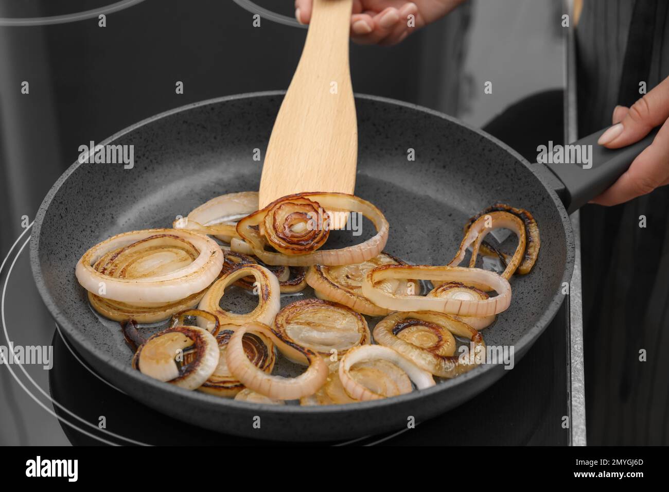 Woman with onion rings hi-res stock photography and images - Alamy