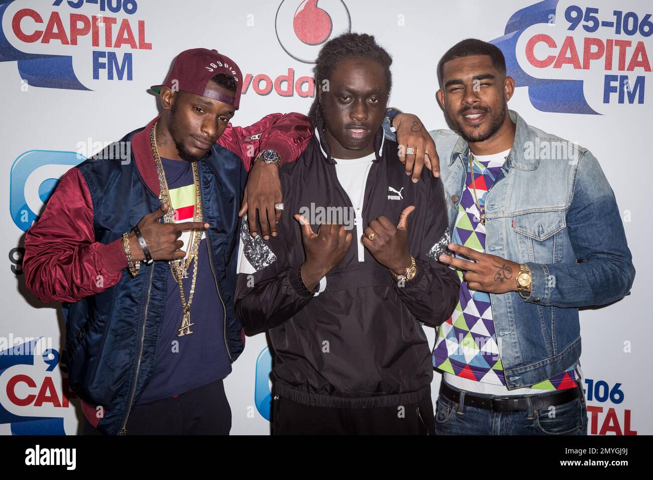 Akelle Charles, Haile Rei and Louis Rei of WSTRN pose for photographers ...