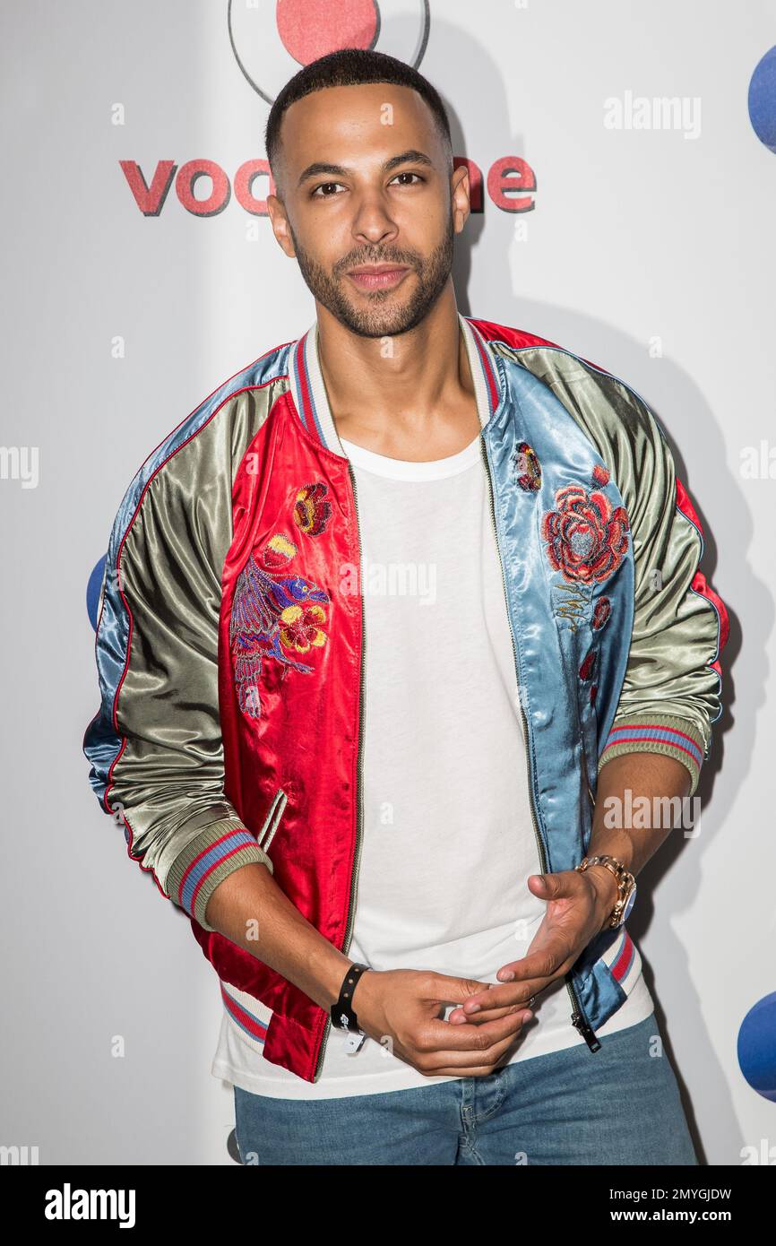 Singer Marvin Humes poses for photographers before performing on stage ...