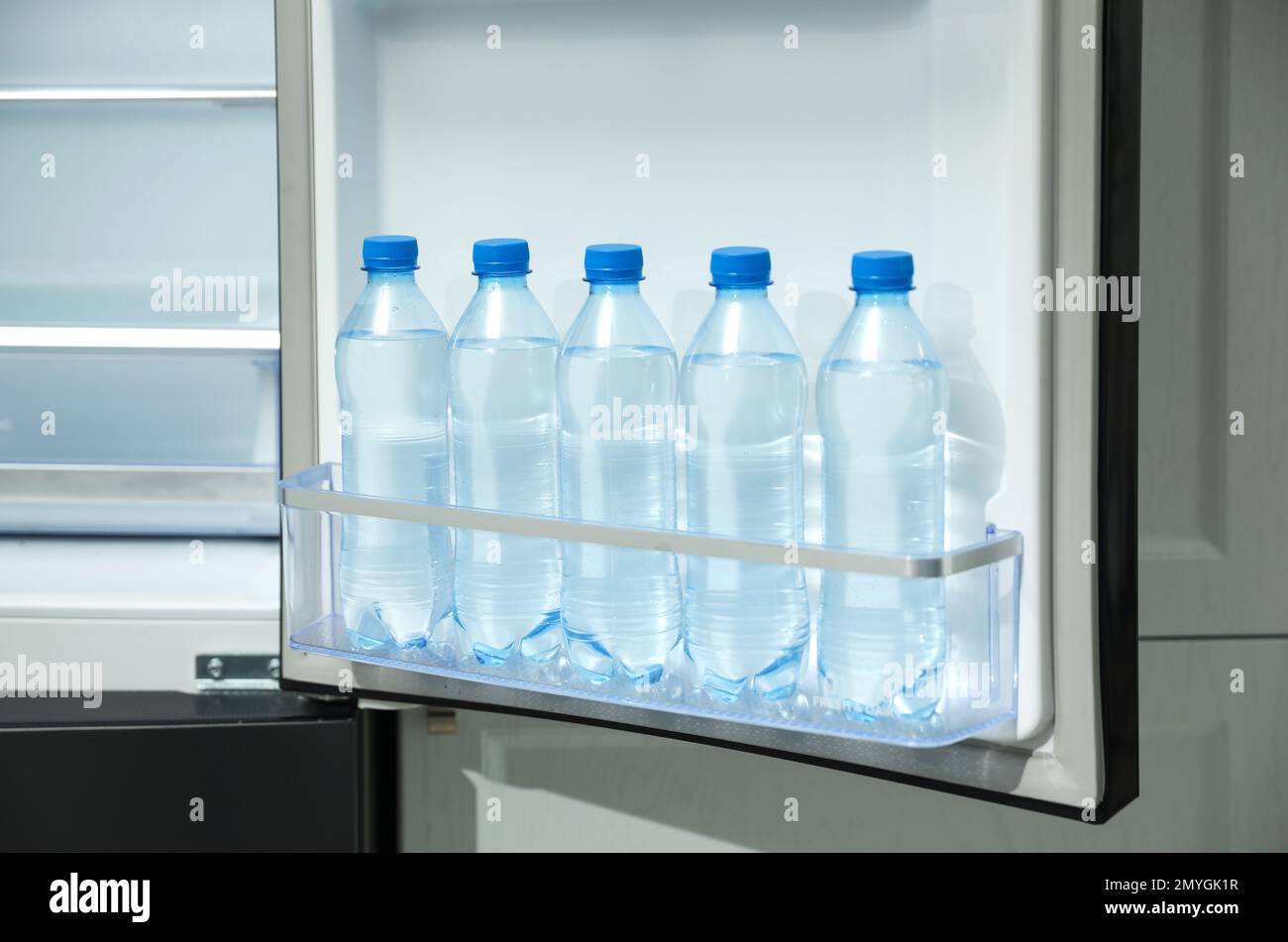 Bottle water in fridge hi-res stock photography and images - Alamy