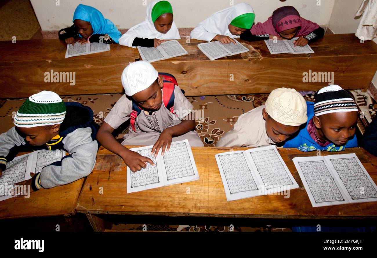 Kenyan Muslim children read the Quran on the fifth day of the Muslim ...