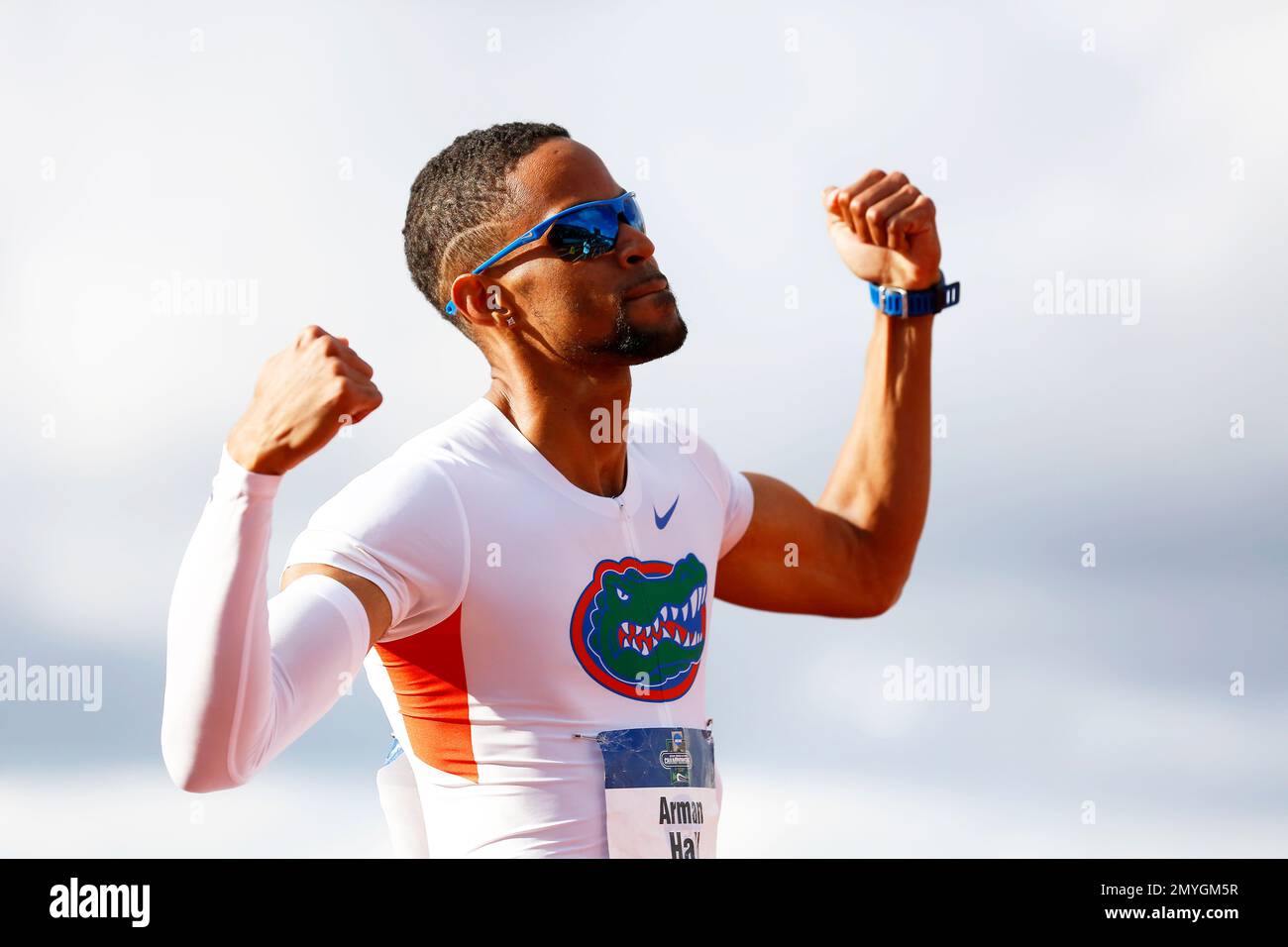 Florida's Arman Hall flexes his muscles after finishing first in the ...