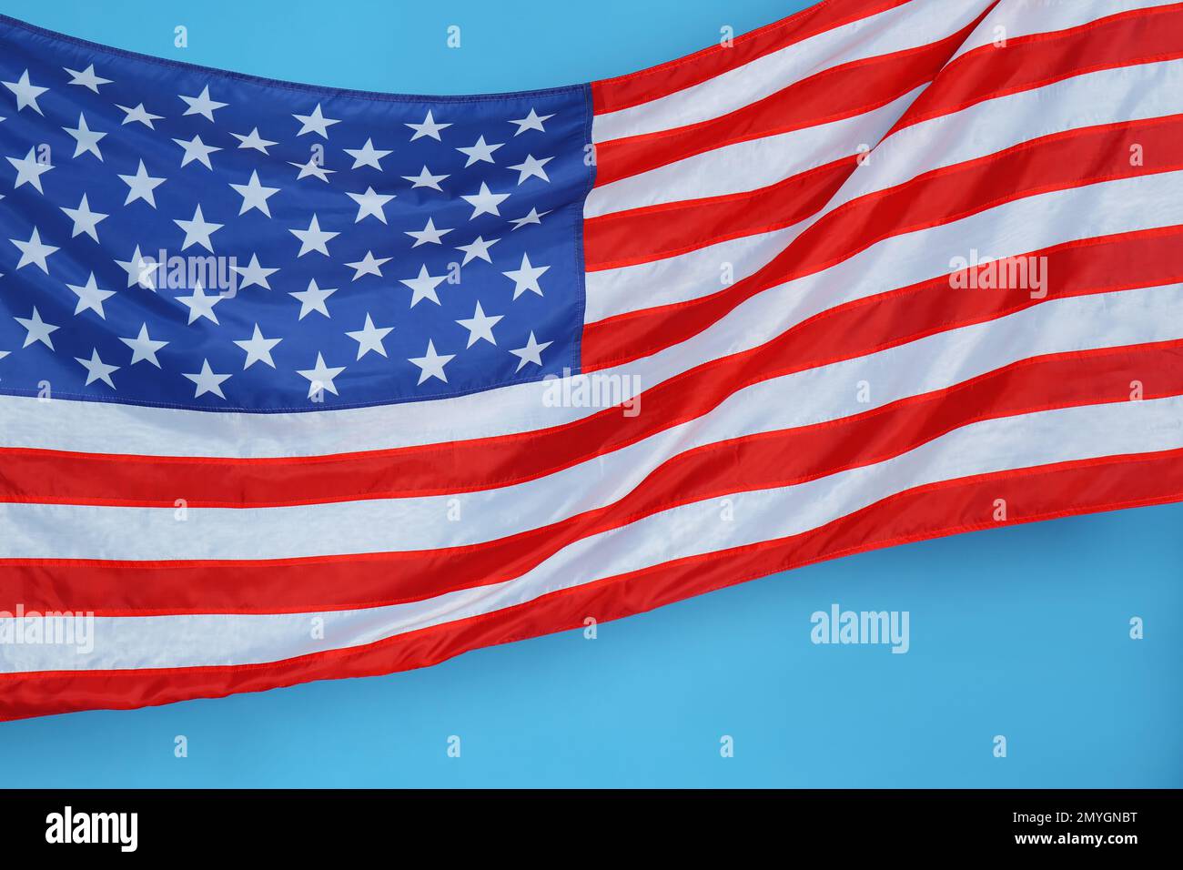 National United states of America flag on light blue background Stock ...